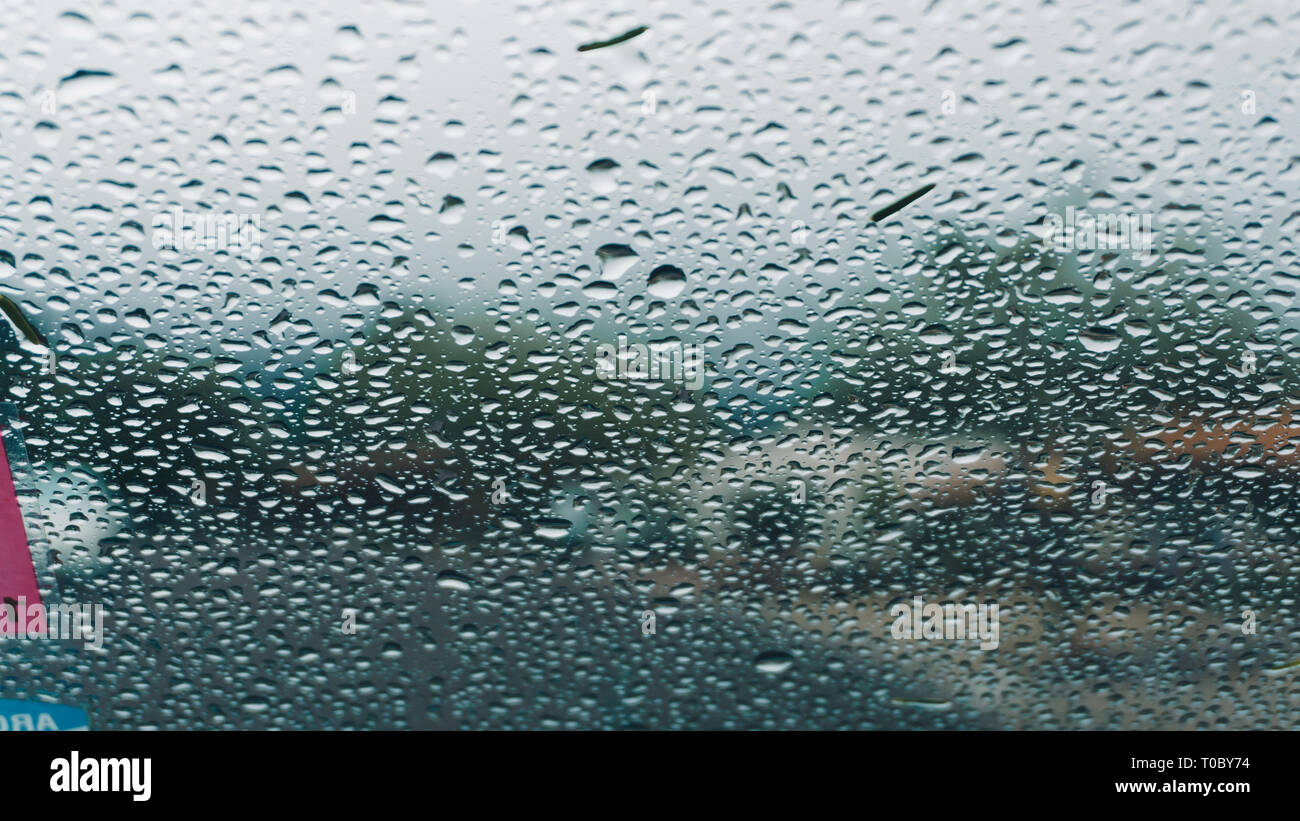 Rain on a car window Stock Photo - Alamy