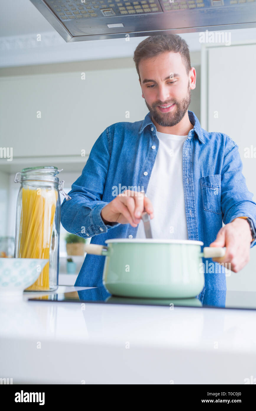 Hispanic boy eating pasta hi-res stock photography and images - Alamy