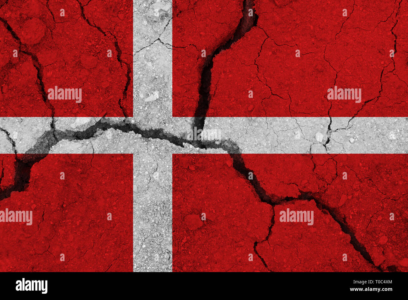 Denmark flag on the cracked earth. National flag of Denmark. Earthquake ...