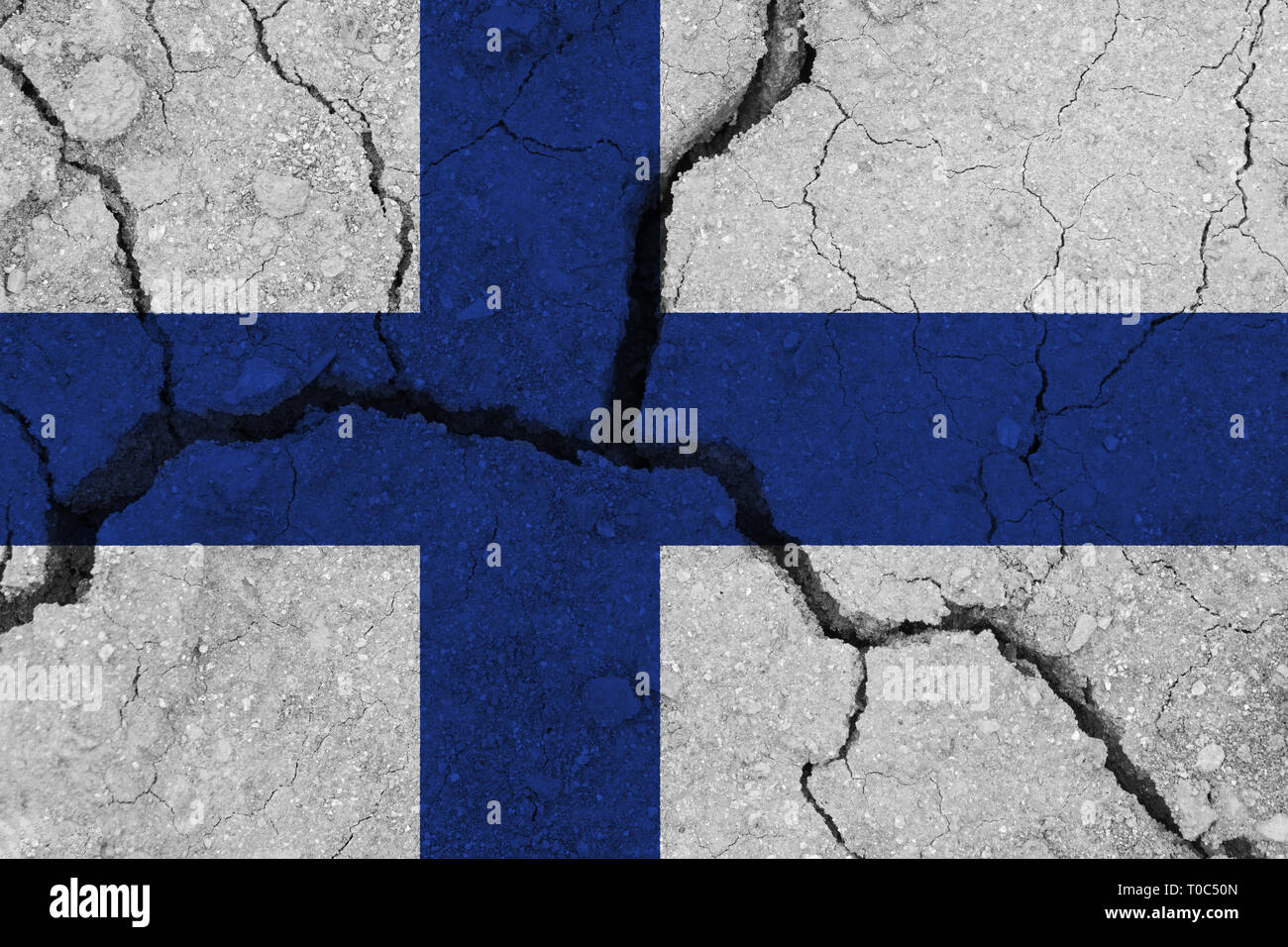 Finland flag on the cracked earth. National flag of Finland. Earthquake ...