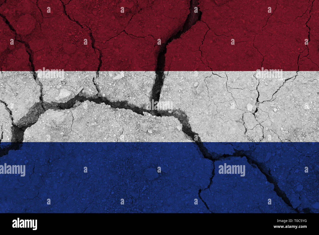 Netherlands flag on the cracked earth. National flag of Netherlands ...