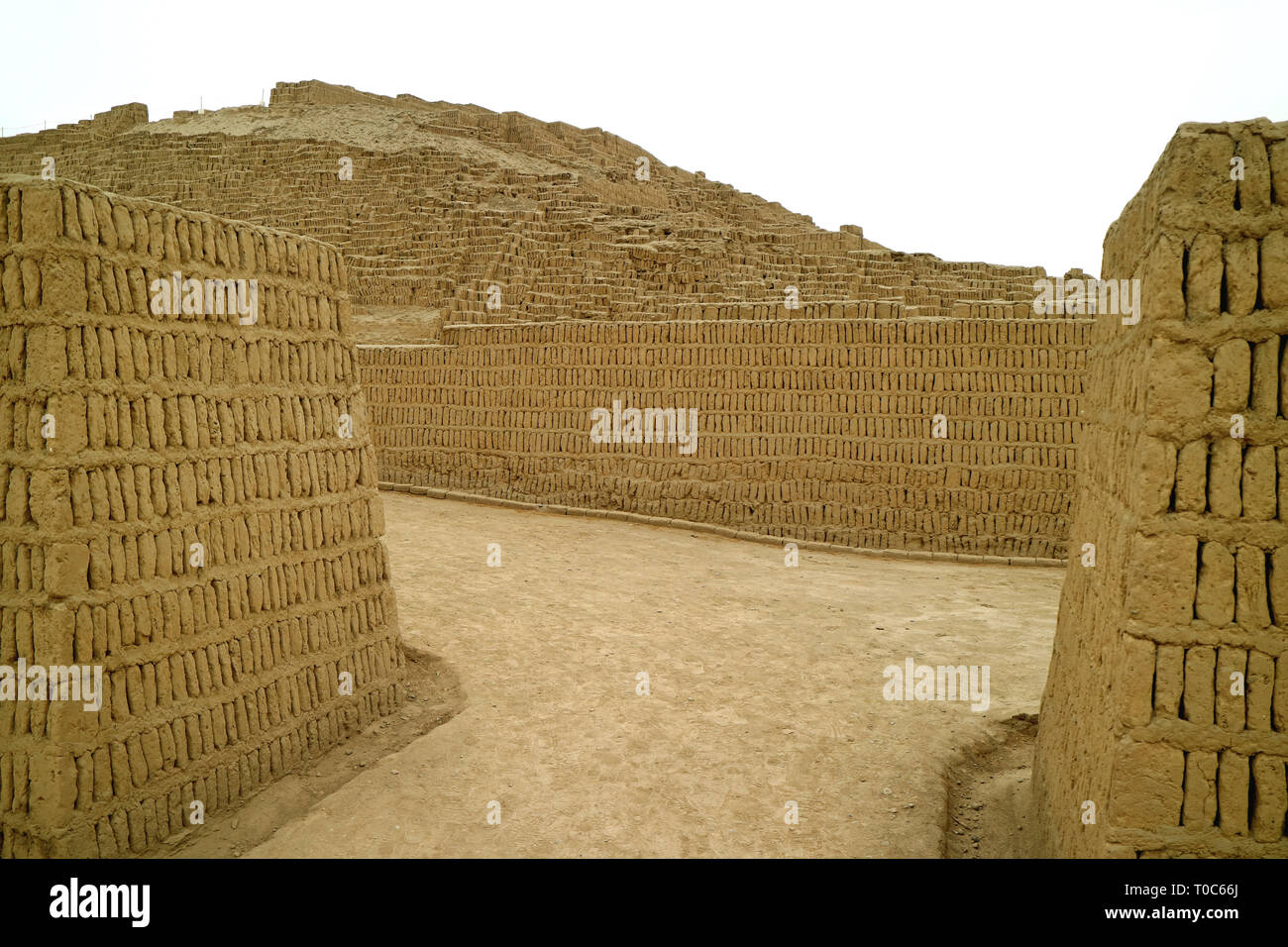 Adobe brick wall of Huaca Pucllana or Huaca Juliana, the Pre-Inca ruins ...