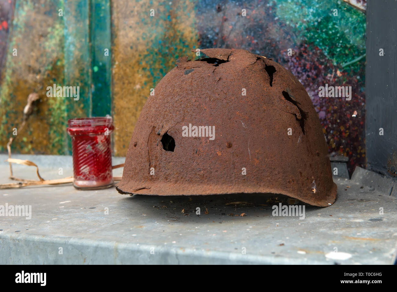 Old rusty soldier's helmet punched by bullets Stock Photo - Alamy