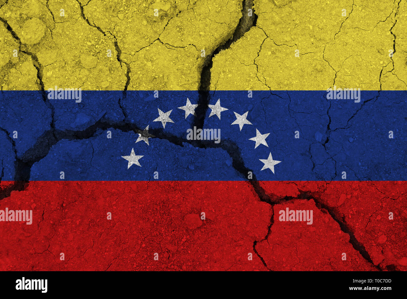Venezuela flag on the cracked earth. National flag of Venezuela ...