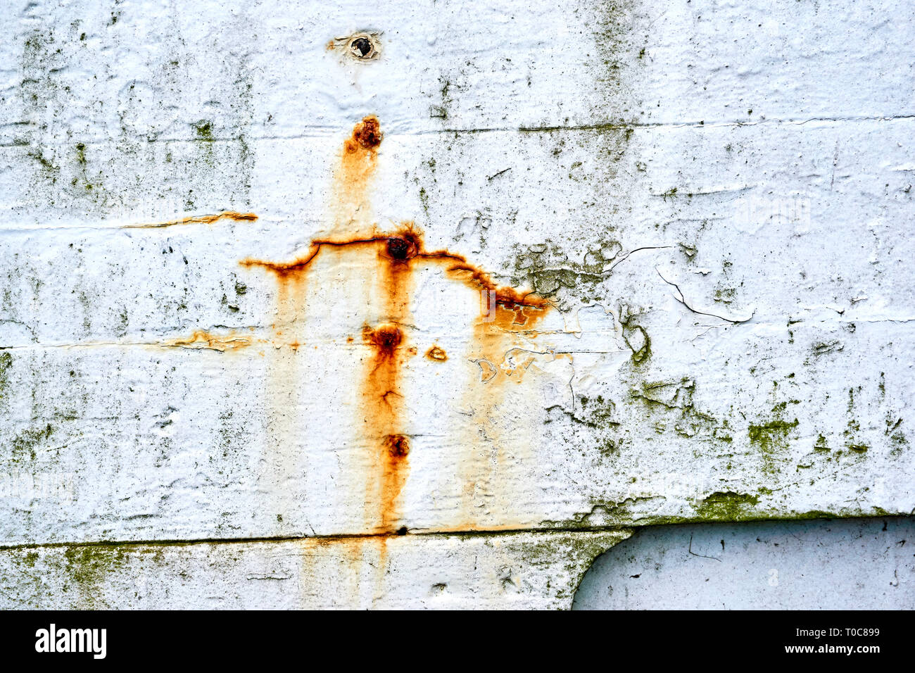 cracked color on a wall outside Stock Photo - Alamy