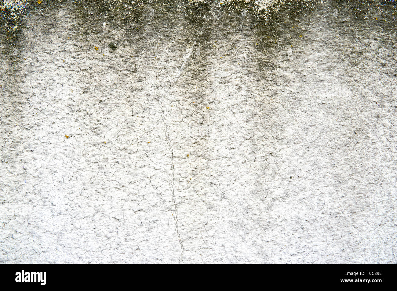cracked color on a wall outside Stock Photo - Alamy