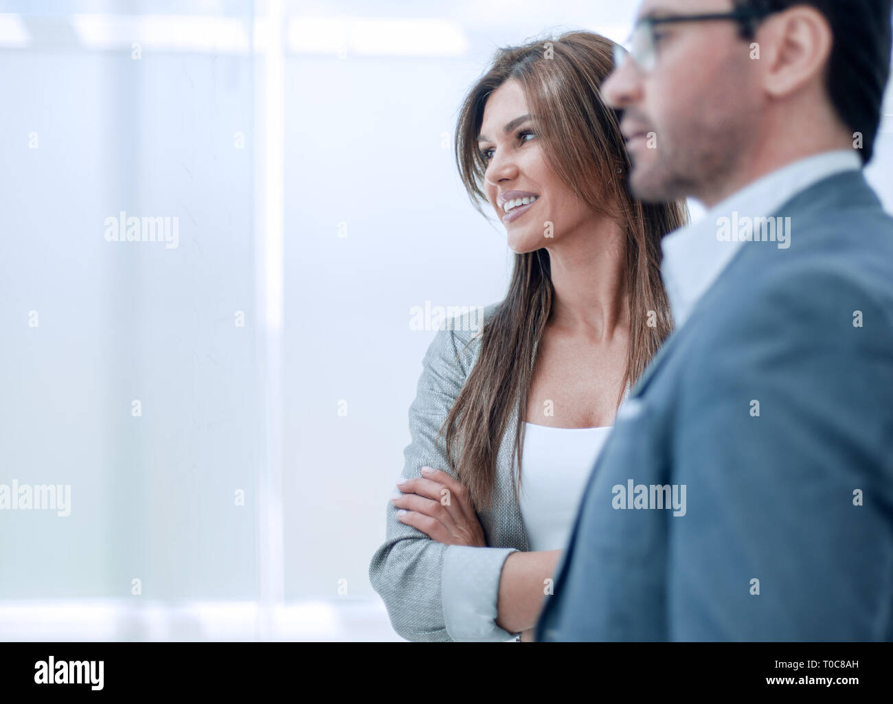 Business partners standing together hi-res stock photography and images ...