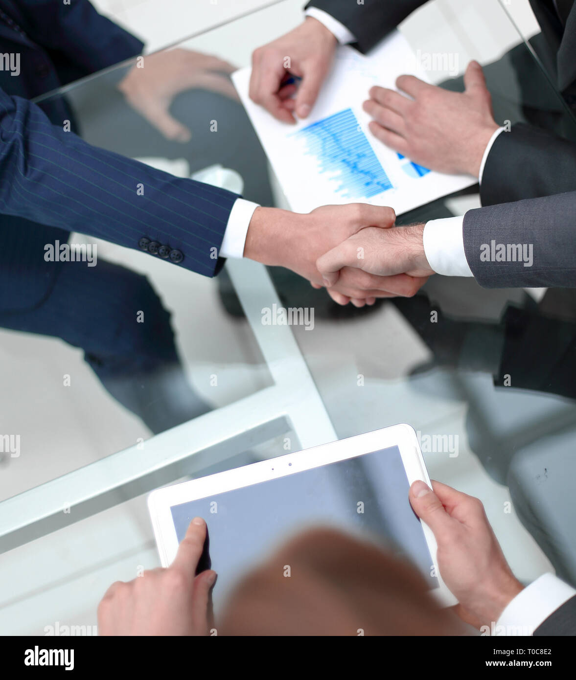close up. investor and businessman shaking hands Stock Photo - Alamy