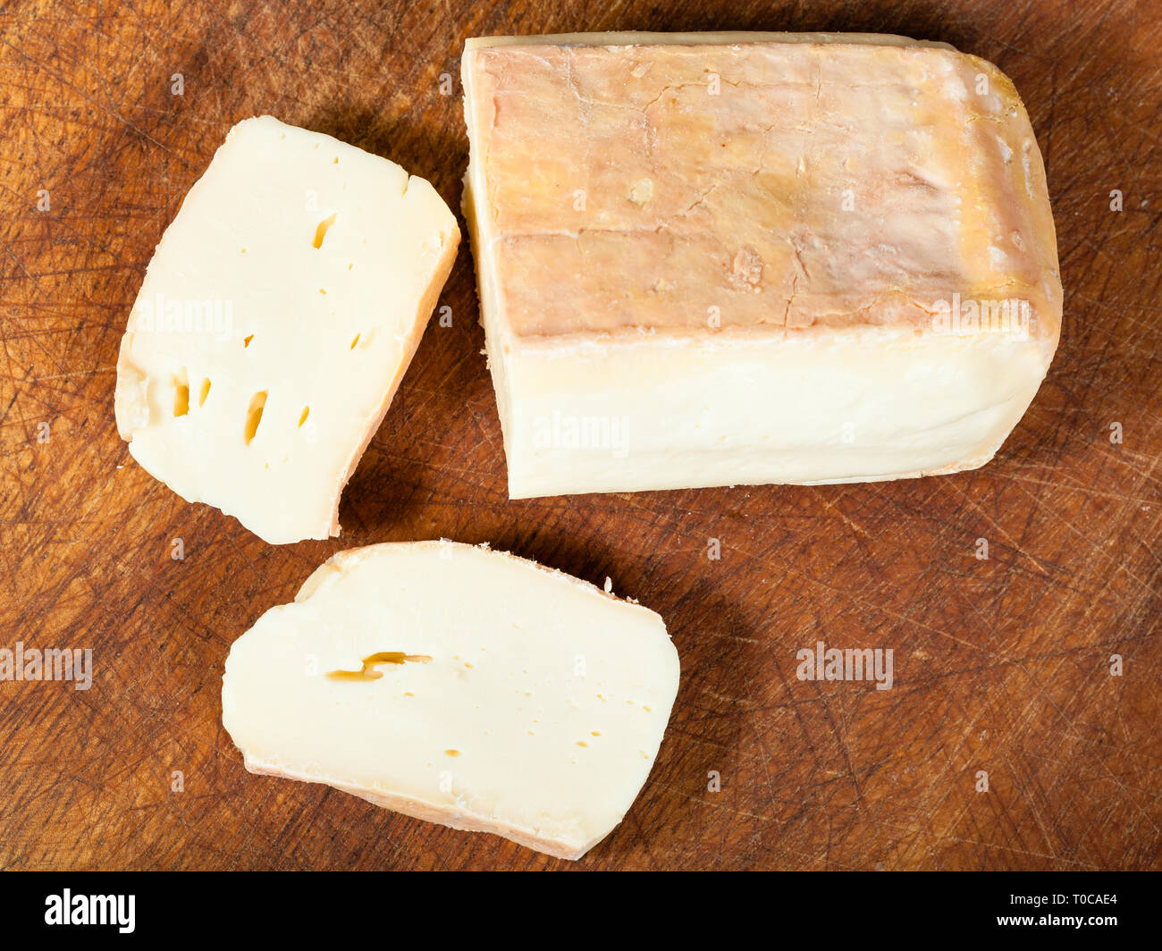 top view of sliced local italian Taleggio cheese from cow's full milk ...
