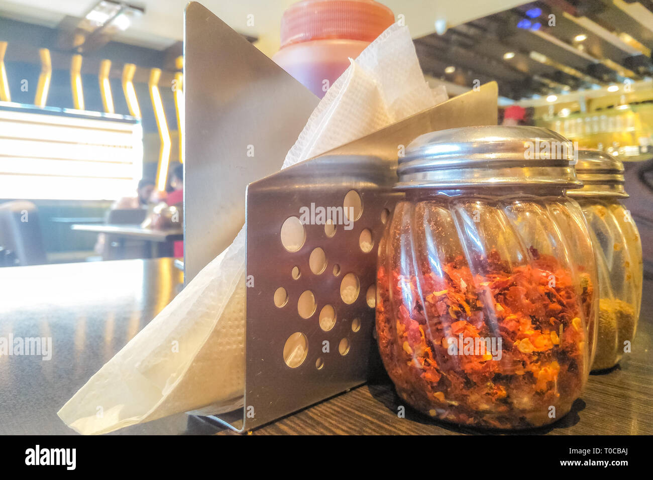 Condiments on restaurant table hi-res stock photography and images - Alamy
