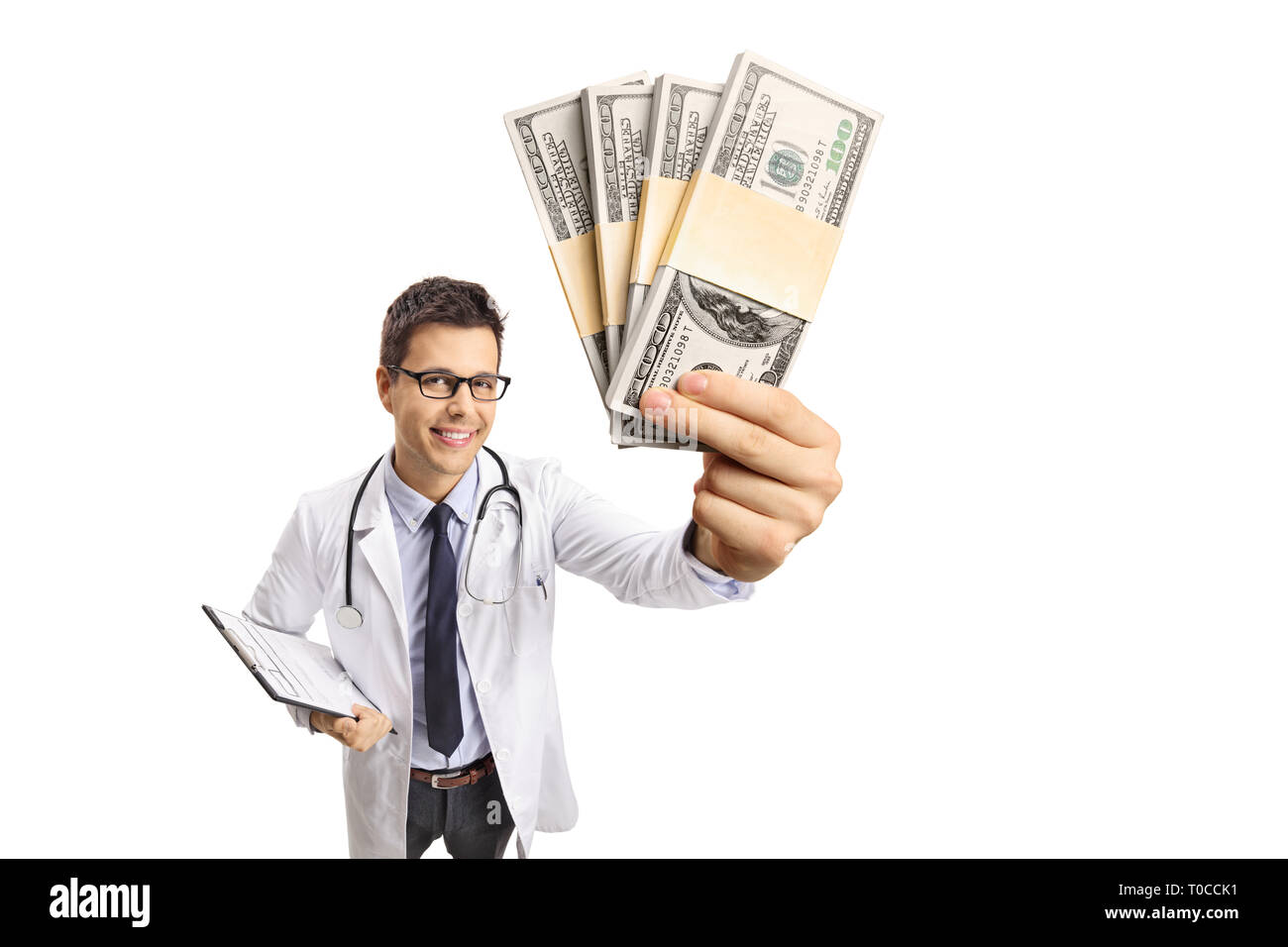 Young doctor holding currency Cut Out Stock Images & Pictures - Alamy