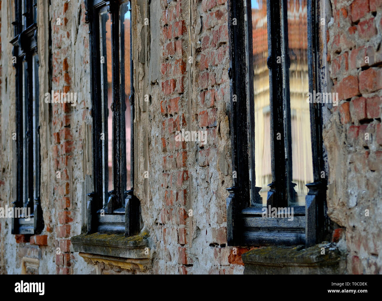 Old style, windows on the brick wall Stock Photo - Alamy