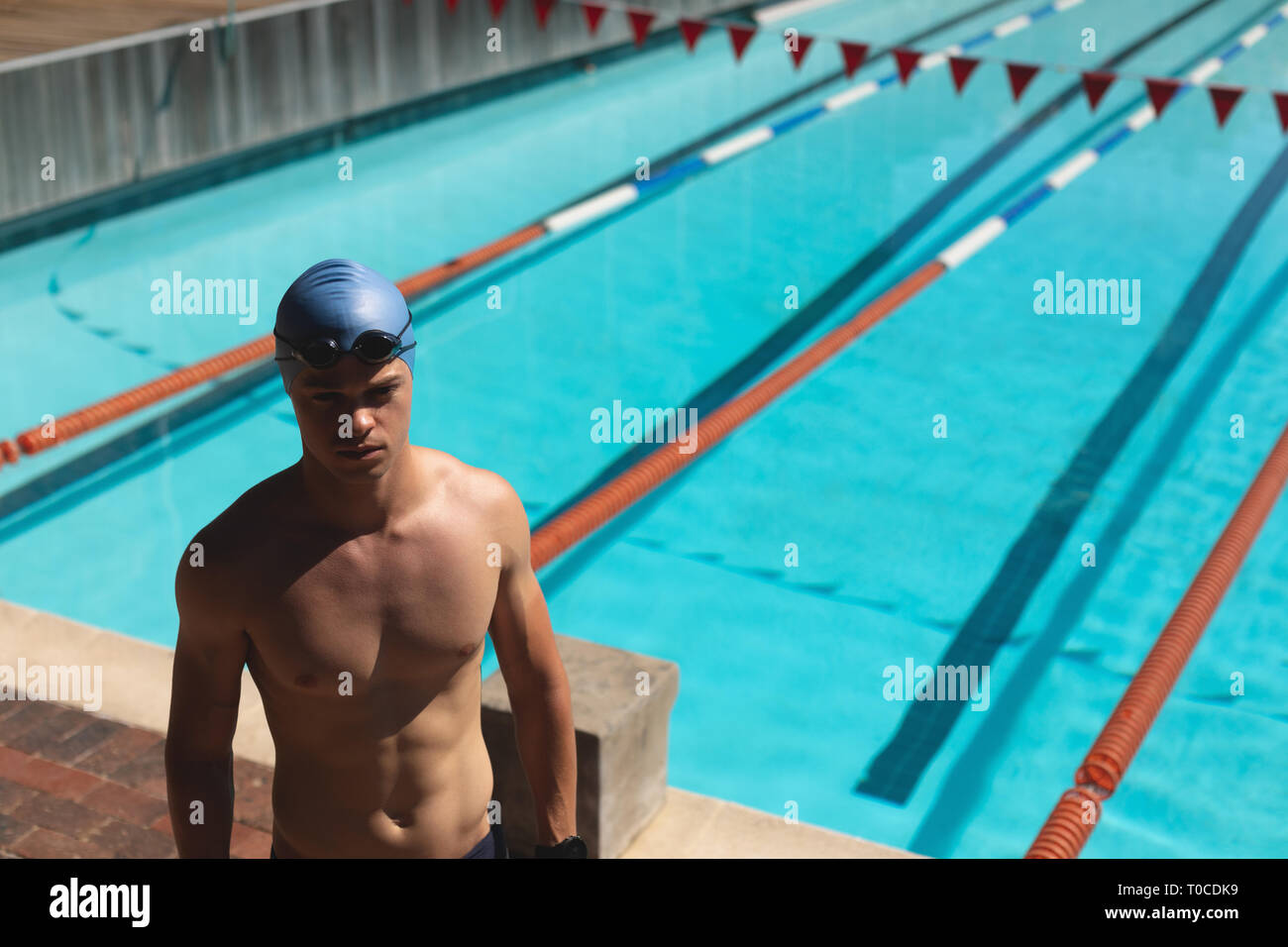 Swimmer standing swimming pool hi-res stock photography and images - Alamy