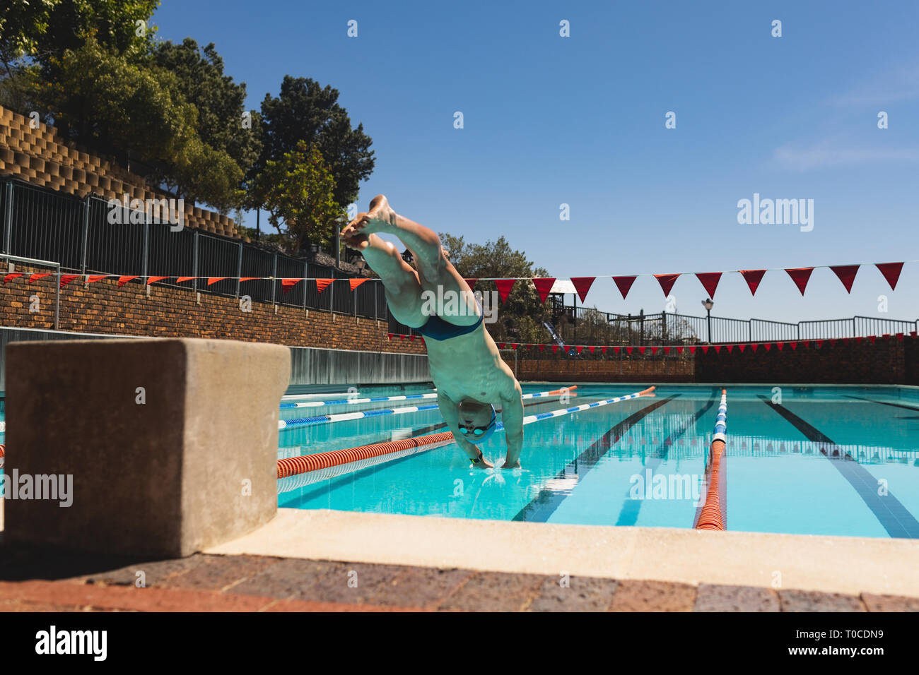 Swimmer jumping hi-res stock photography and images - Alamy