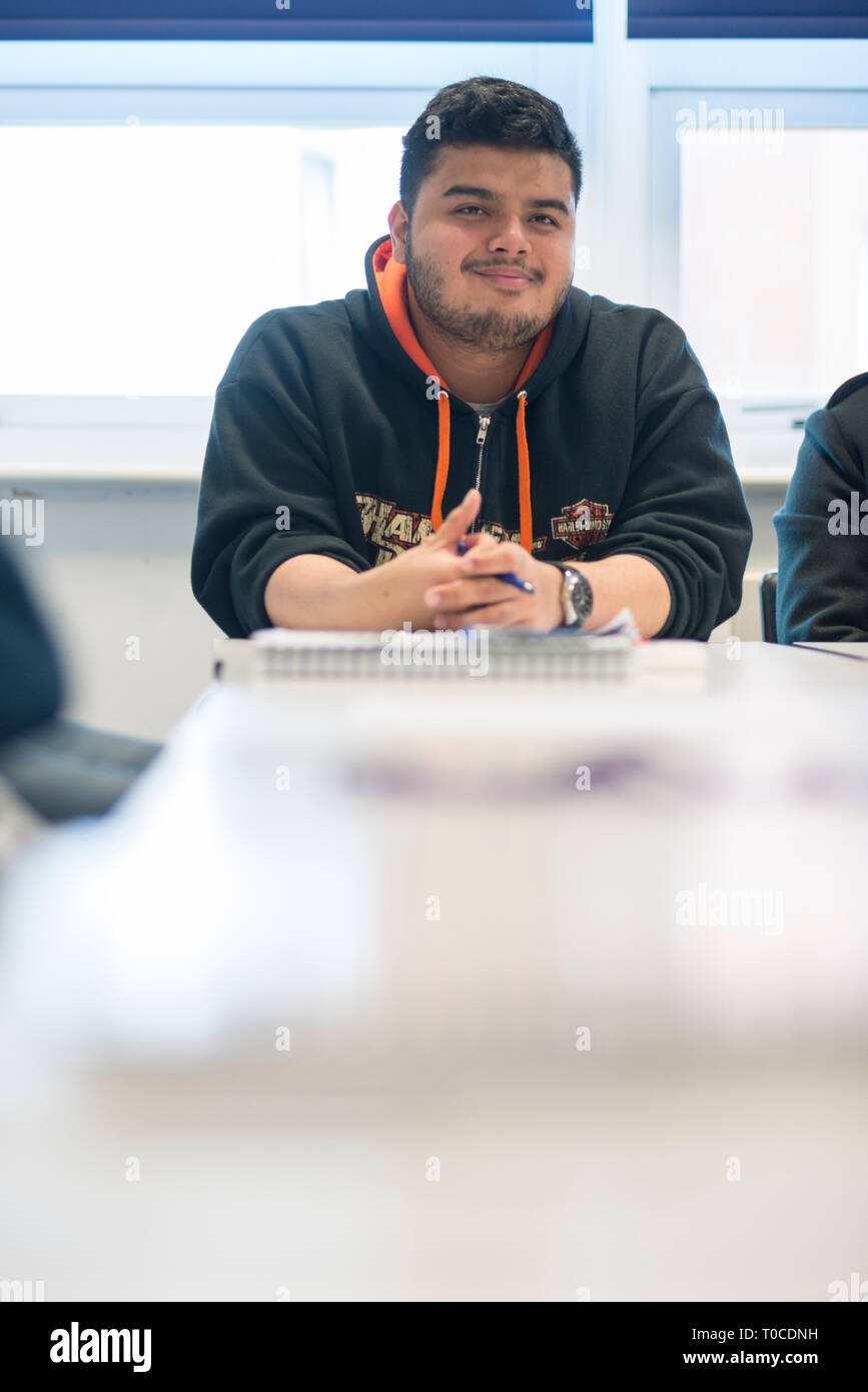 Portrait of an international student on the college campus / grounds ...