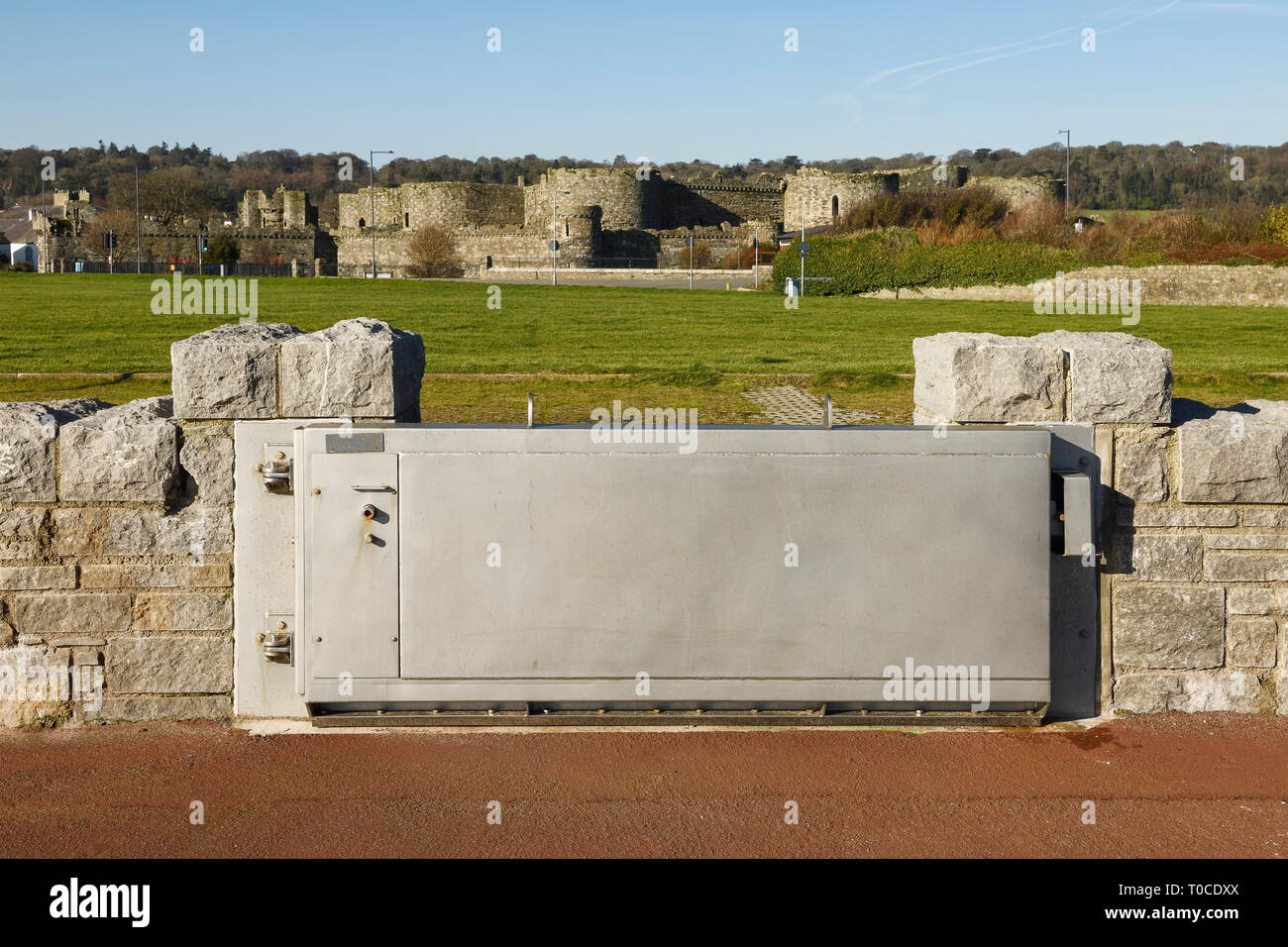 A flood defence barrier gate on the seafront near the castle in ...
