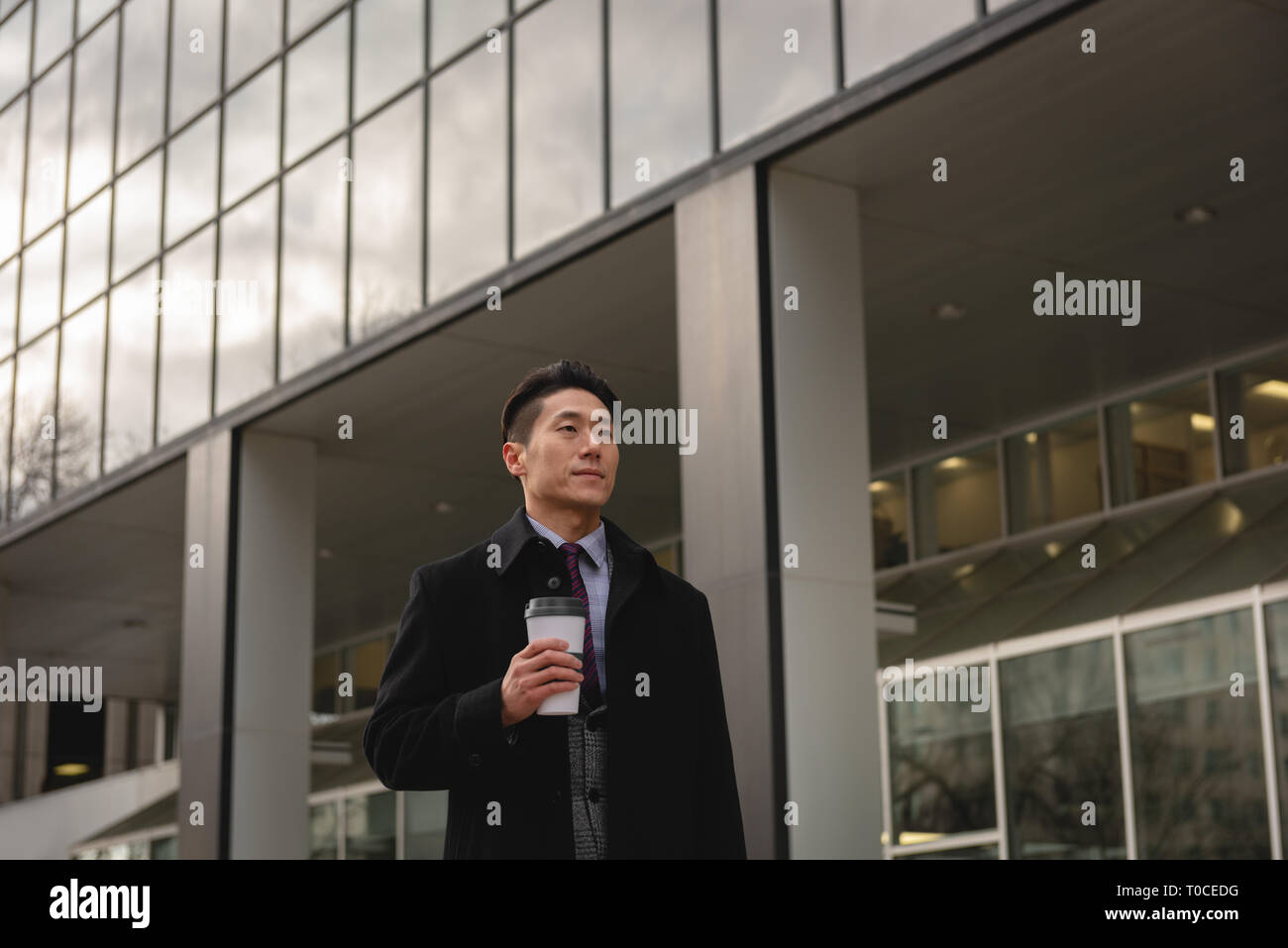 Walking with coffee cup hi-res stock photography and images - Alamy