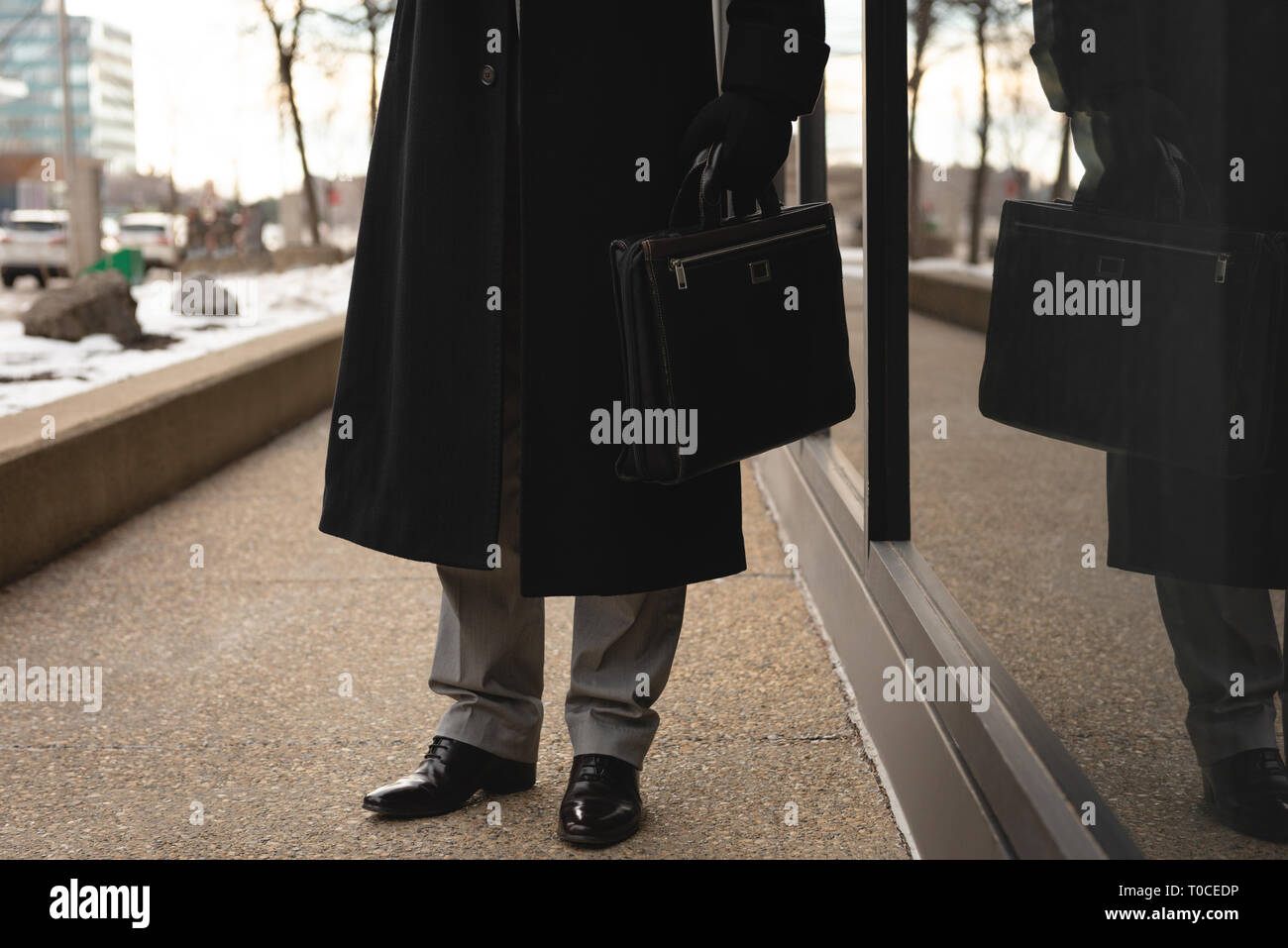Businessman standing on street man hi-res stock photography and images ...