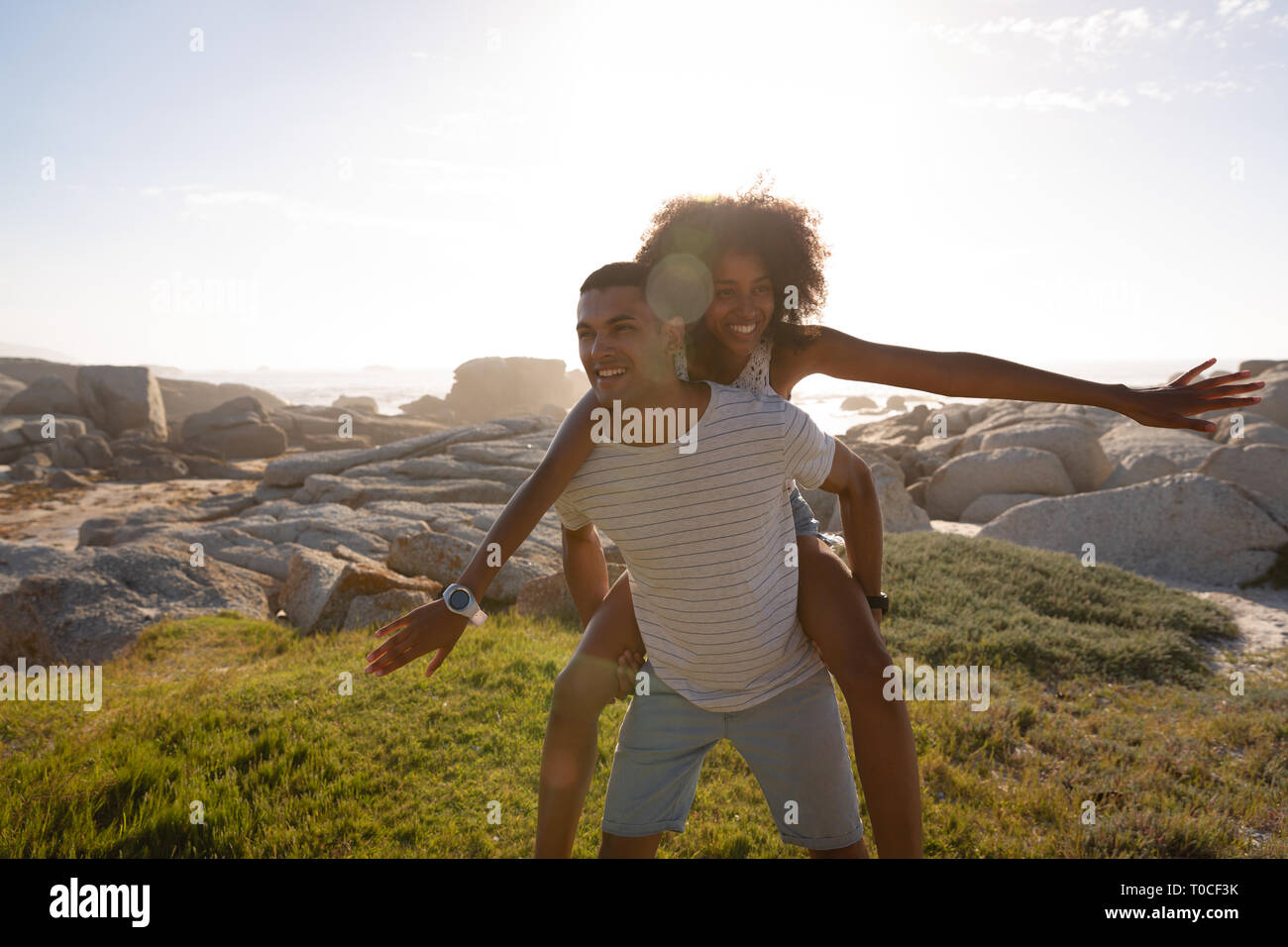 Man giving piggyback ride hi-res stock photography and images - Alamy