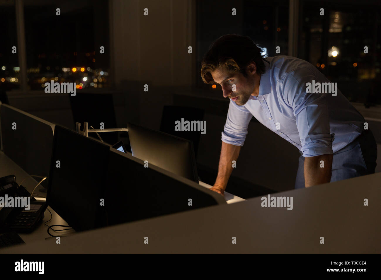 Male executive standing in modern hi-res stock photography and images ...