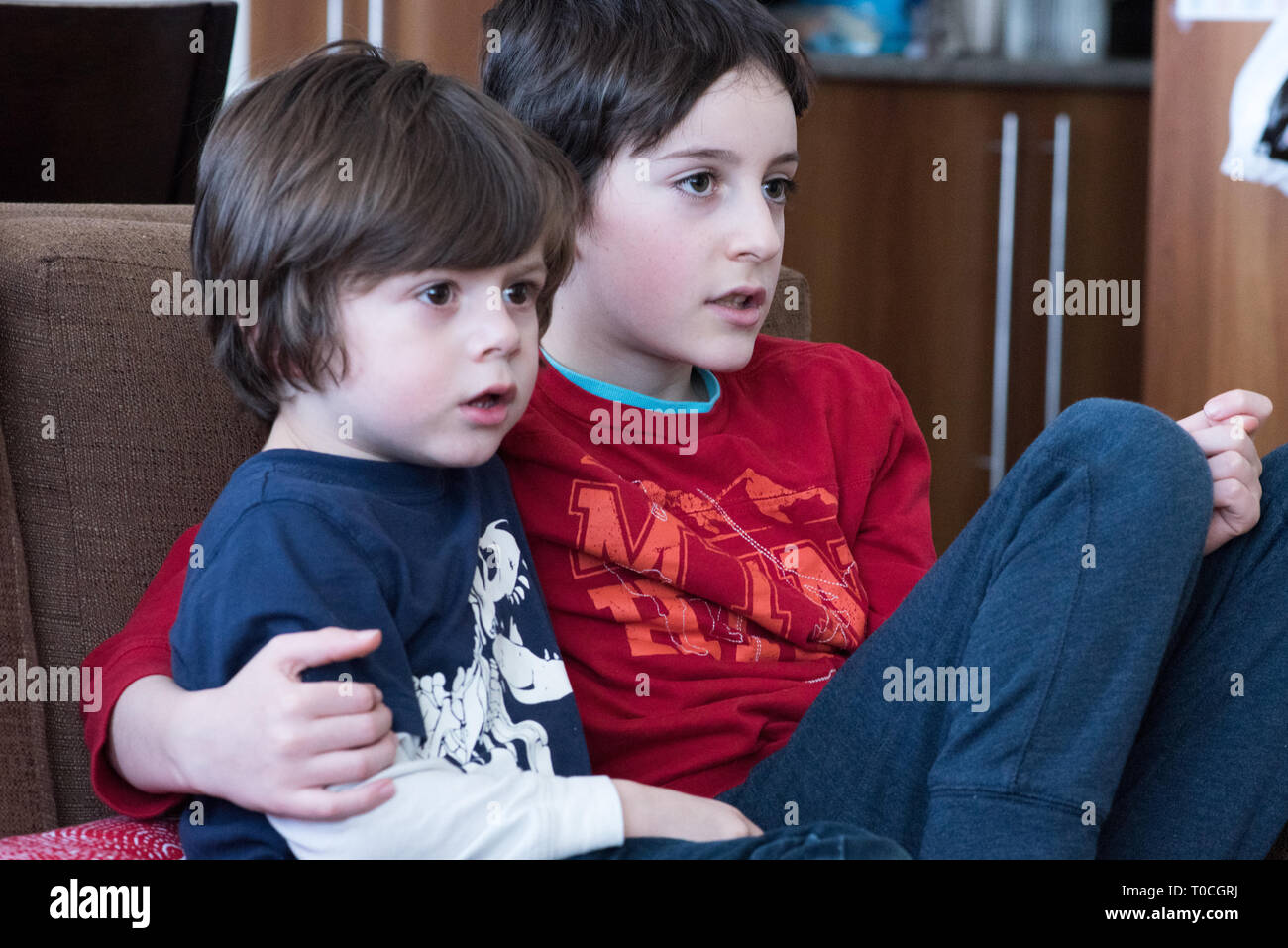 Older and younger children hi-res stock photography and images - Alamy