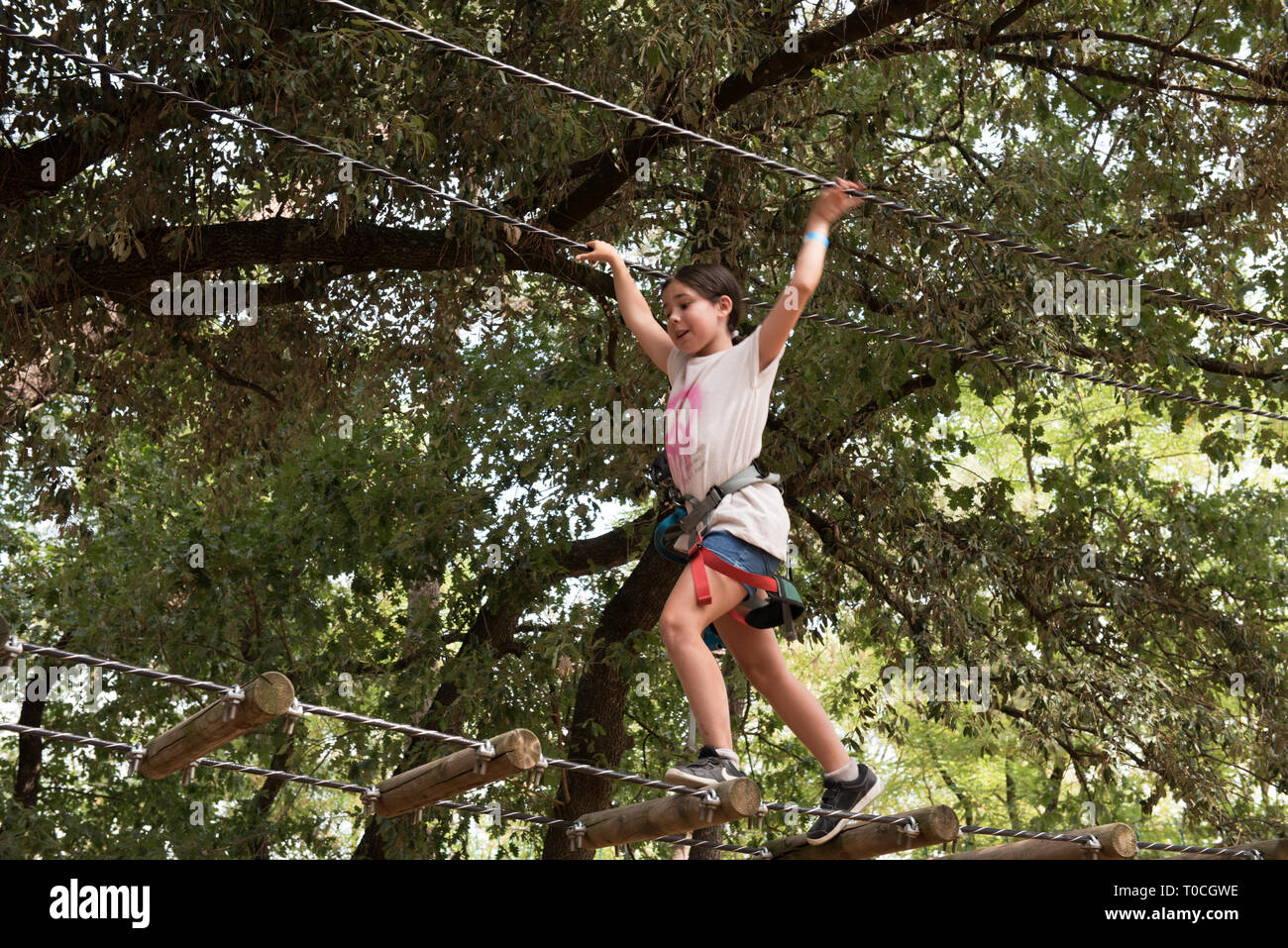 Child ziplining hi-res stock photography and images - Alamy