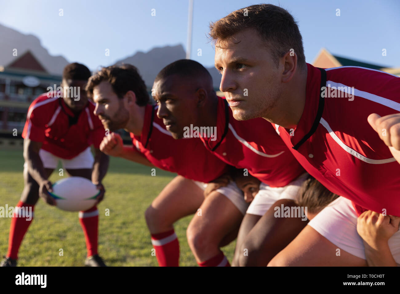 Male rugby players playing rugby in the ground Stock Photo - Alamy