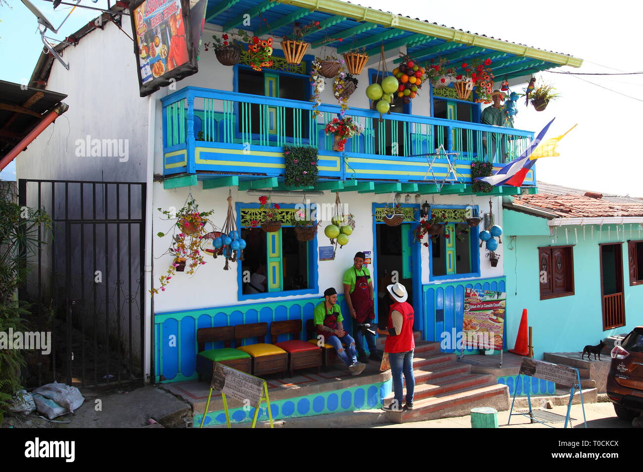 Brightly painted shops and restaurants in the town of Salento, in the ...