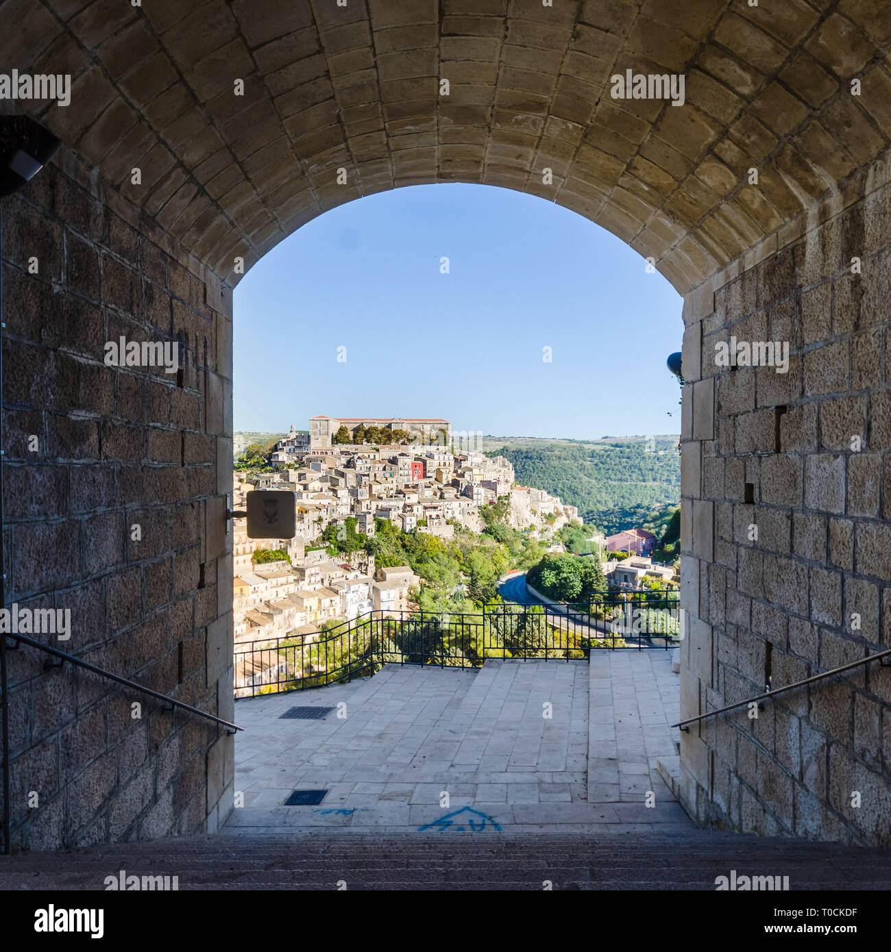 View of Ragusa Ibla medieval town through a staircase passageway ...