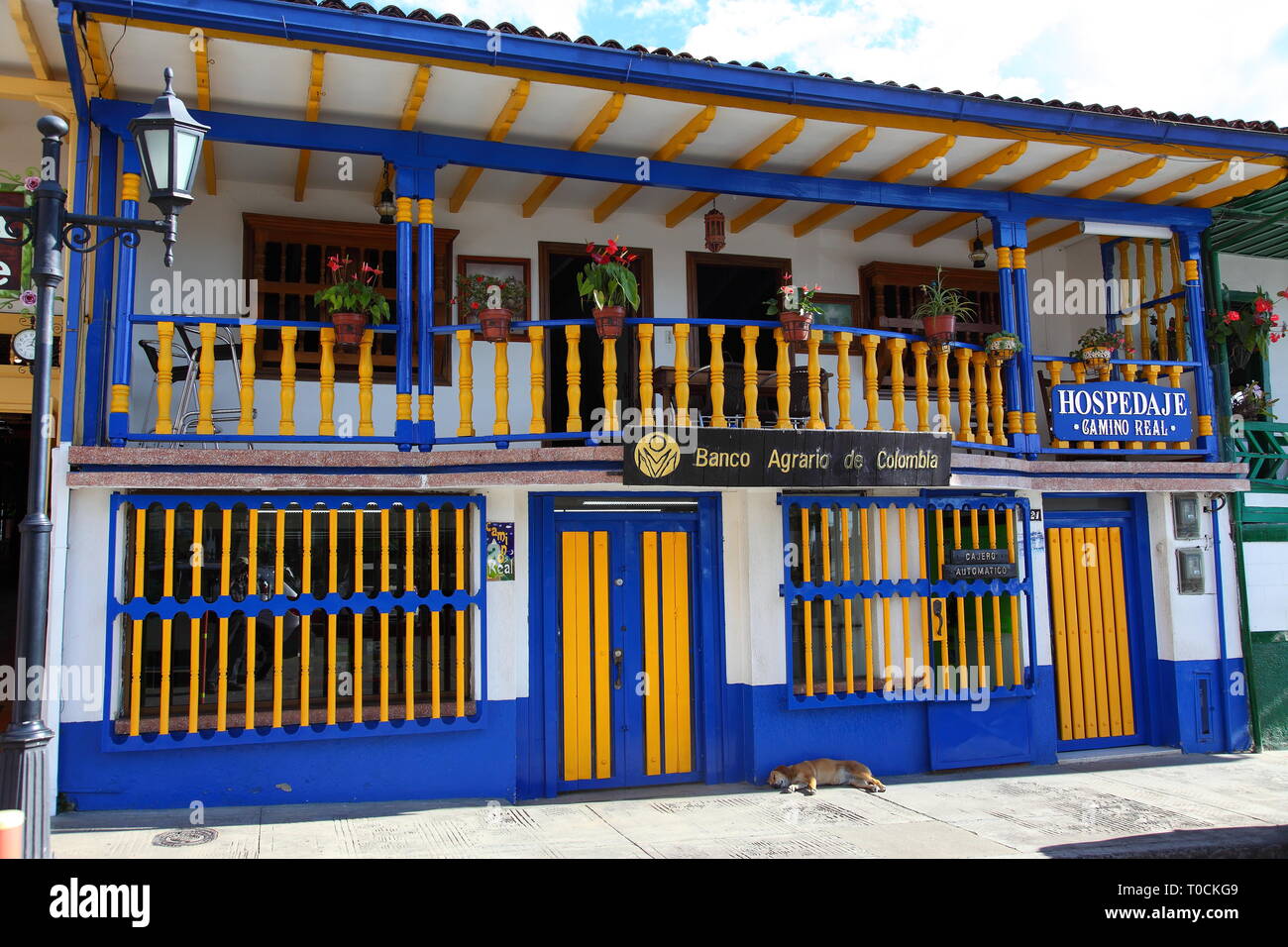 Brightly painted shops and restaurants in the town of Salento, in the ...