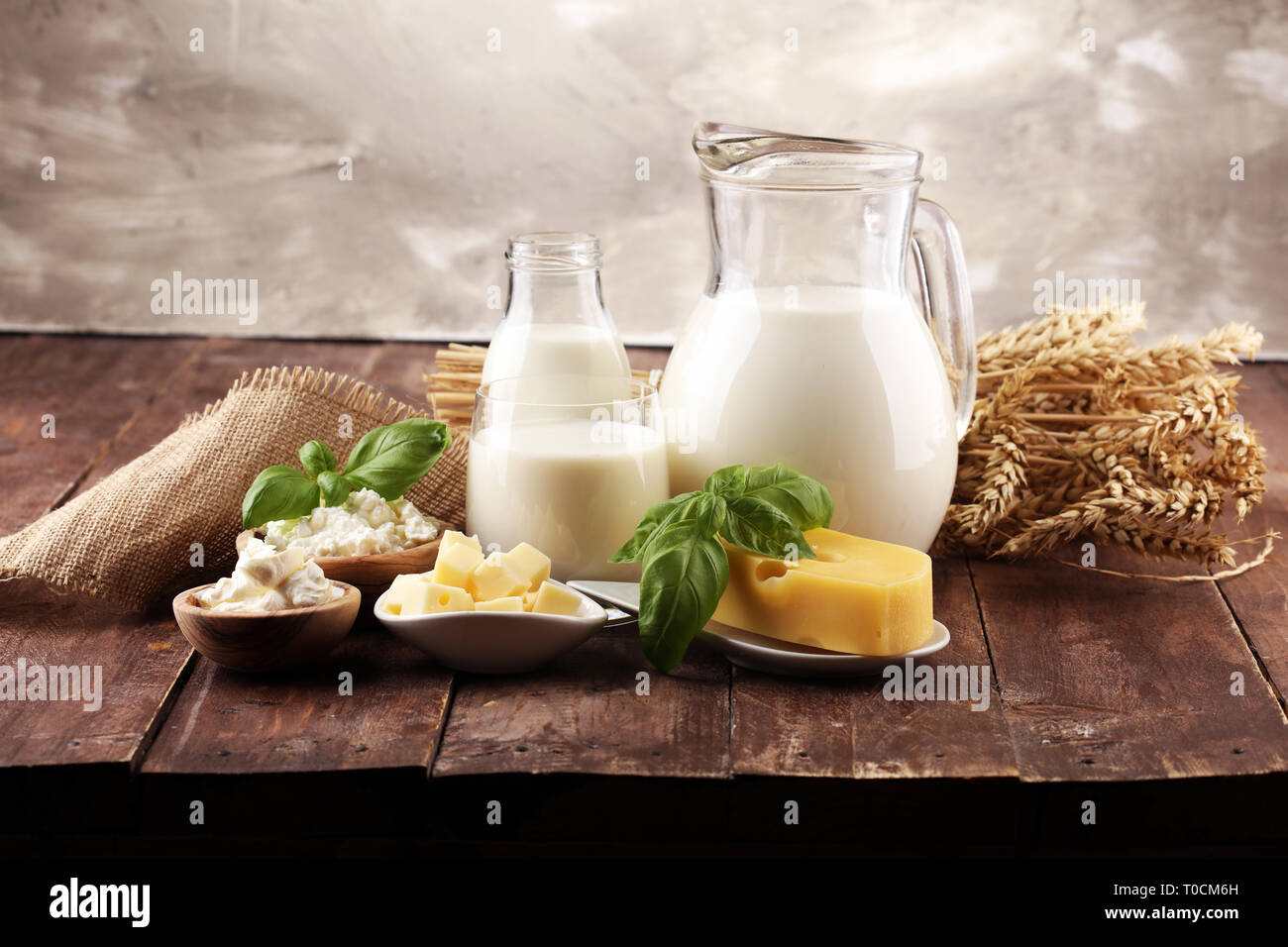 milk products. tasty healthy dairy products on a table and milk jar ...
