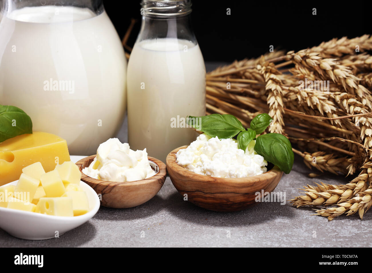 milk products. tasty healthy dairy products on a table and milk jar ...