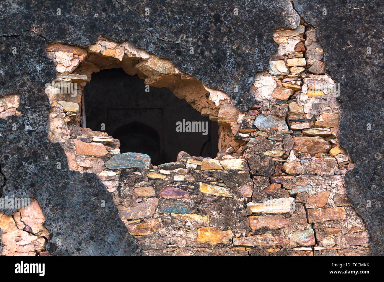 Hole stone wall hi-res stock photography and images - Alamy