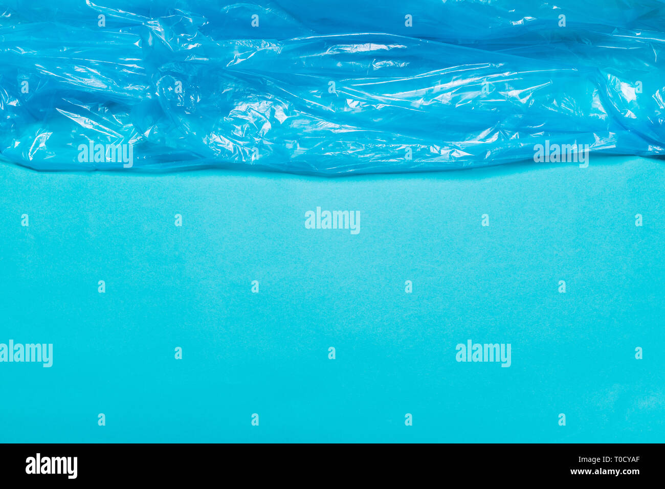 Background of blue plastic package. The concept of using ...
