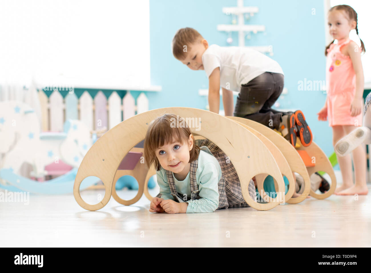 Kids playing in kindergarten or daycare centre Stock Photo - Alamy