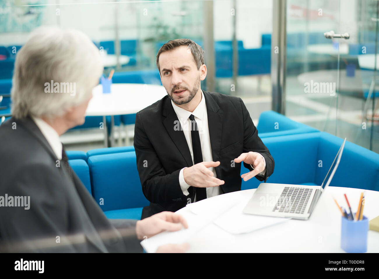 Two people meeting discussing hi-res stock photography and images - Alamy