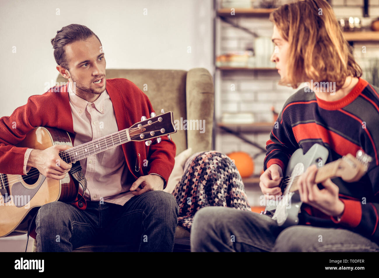 Guitar in studio student hi-res stock photography and images - Alamy