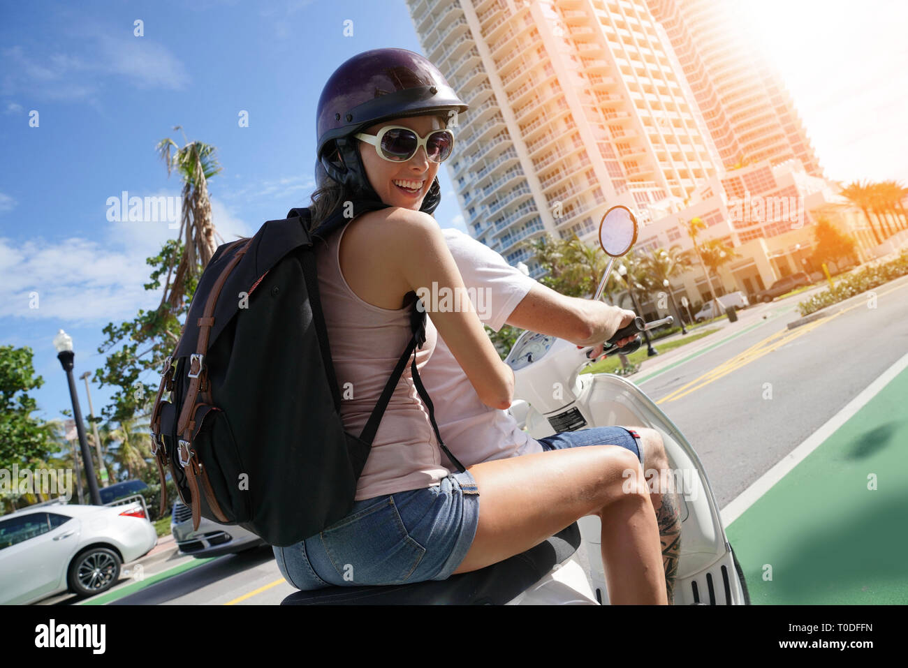 Couple scooter helmets hi-res stock photography and images - Alamy