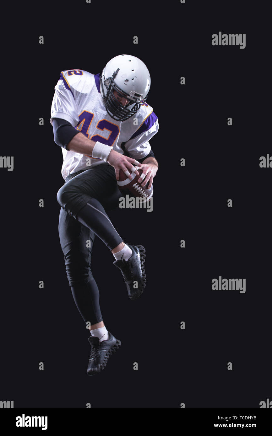 High jump of American Footballer Stock Photo - Alamy