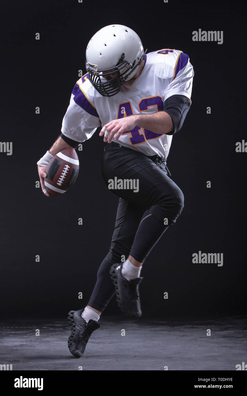 High jump of American Footballer Stock Photo - Alamy