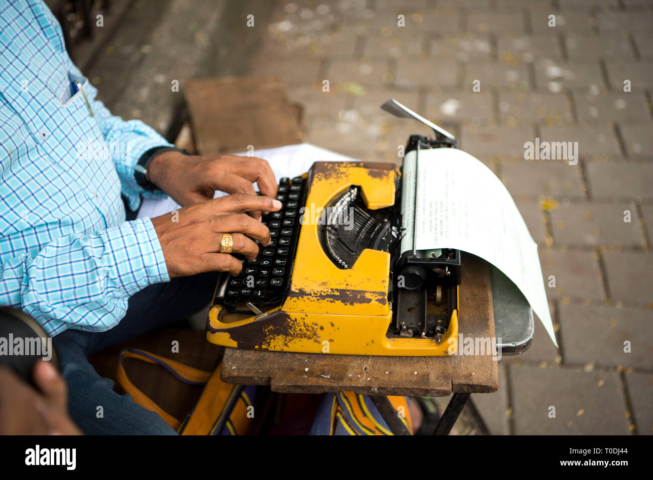 Pavement typist hi-res stock photography and images - Alamy