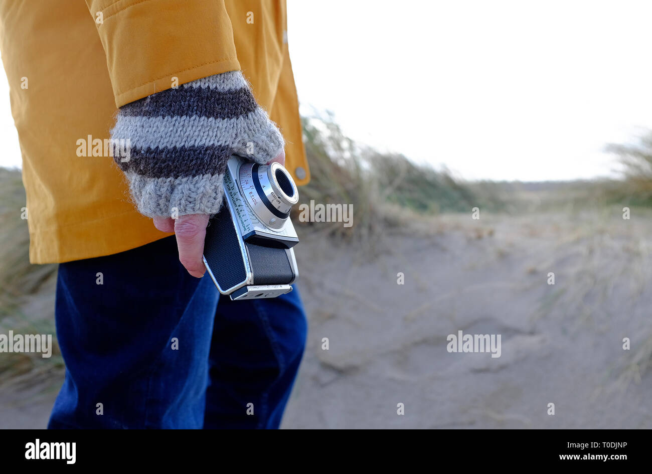 Person holding camera hi-res stock photography and images - Alamy