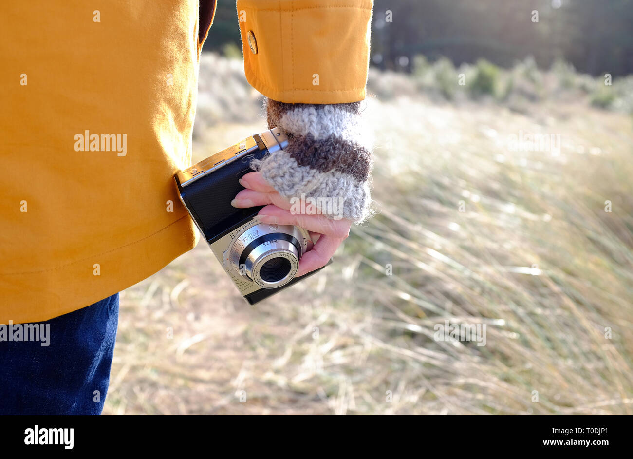 Person holding camera hi-res stock photography and images - Alamy