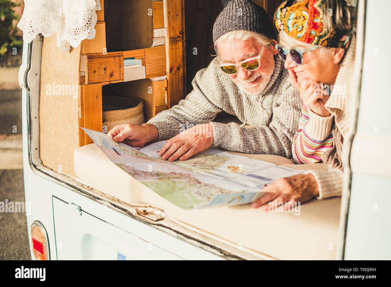 Mature couple vintage camper van hi-res stock photography and images ...
