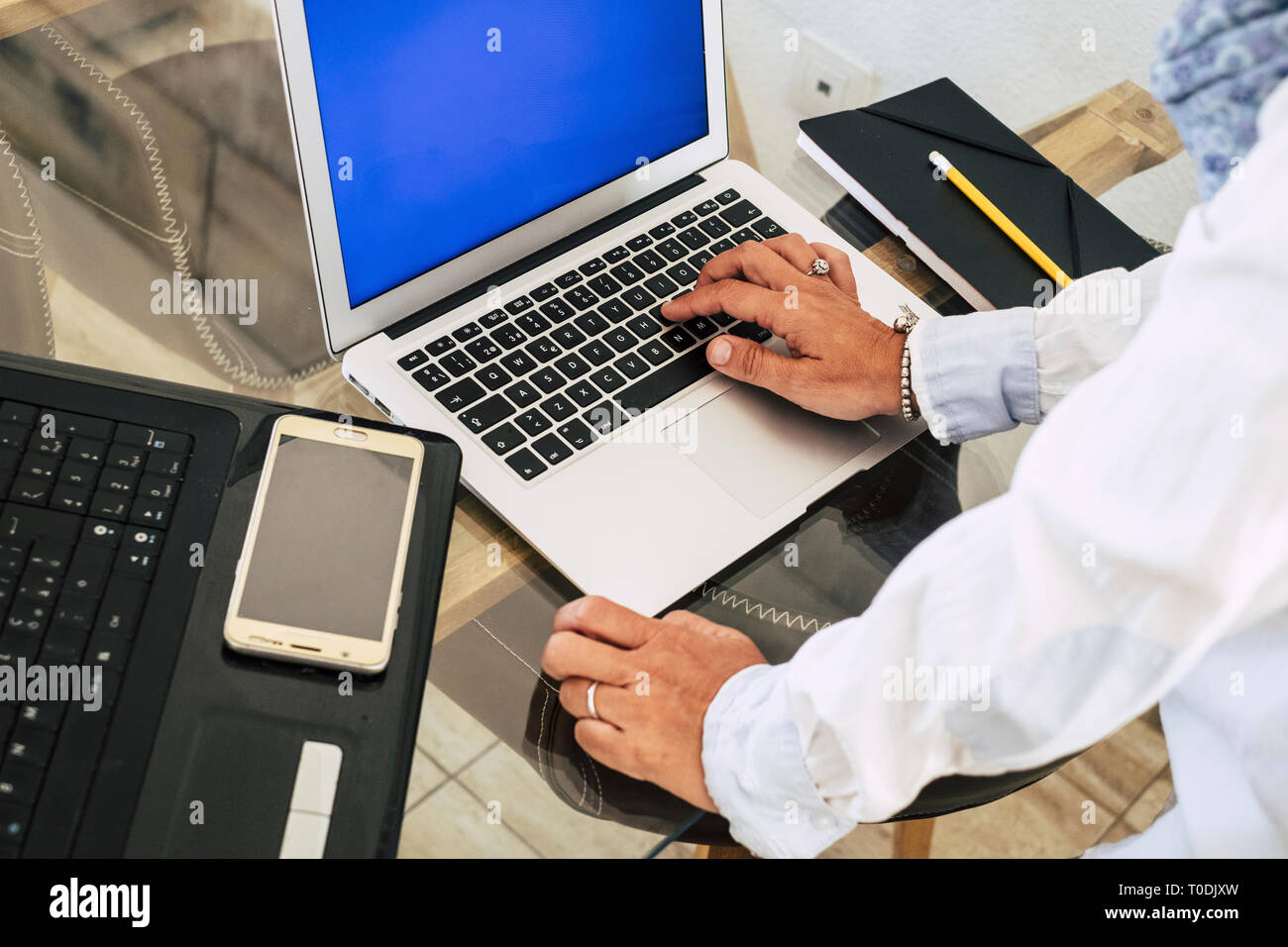 Workstation typing hi-res stock photography and images - Alamy