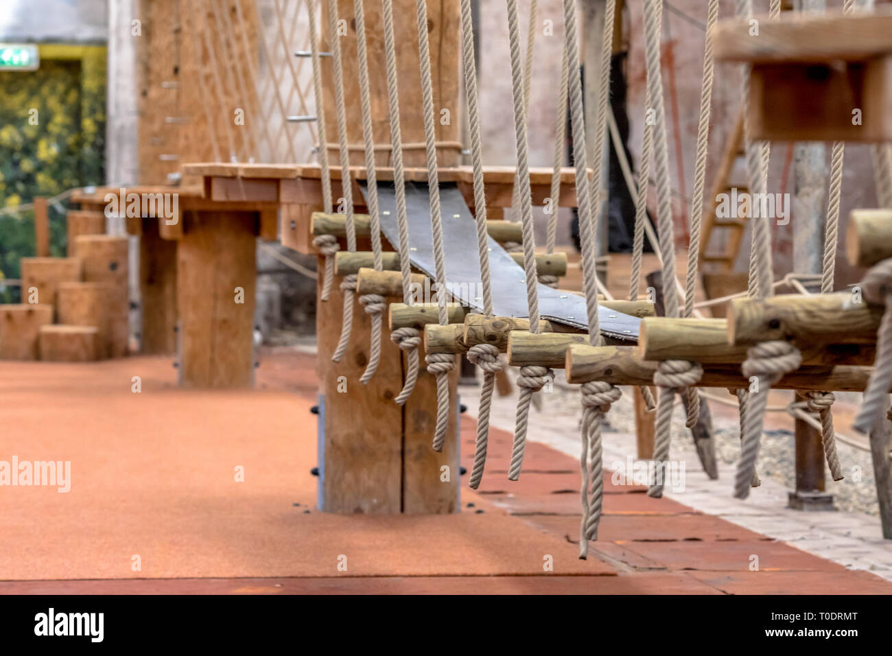 Rope bridge in Indoor adventure park as concept for balance in business ...