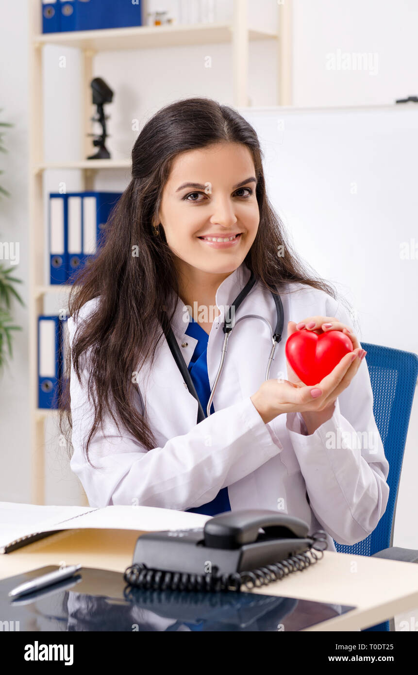 Female doctor cardiologist working in the clinic Stock Photo - Alamy