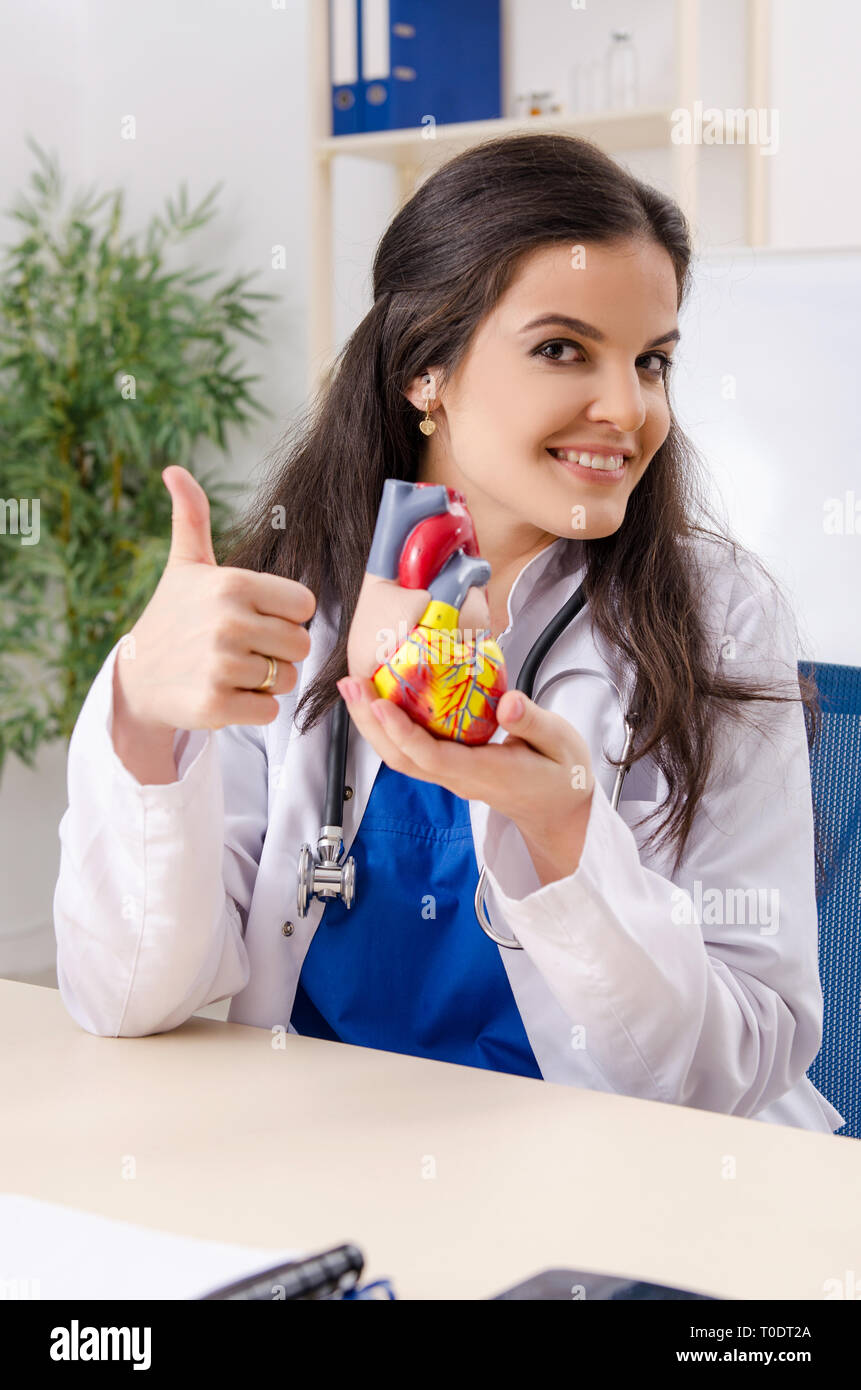 Female doctor cardiologist working in the clinic Stock Photo - Alamy
