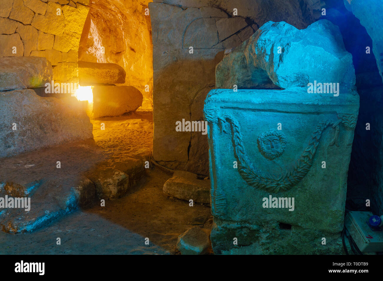 Sarcophagus (Roman period coffin) with carving of Zeus head, in a ...