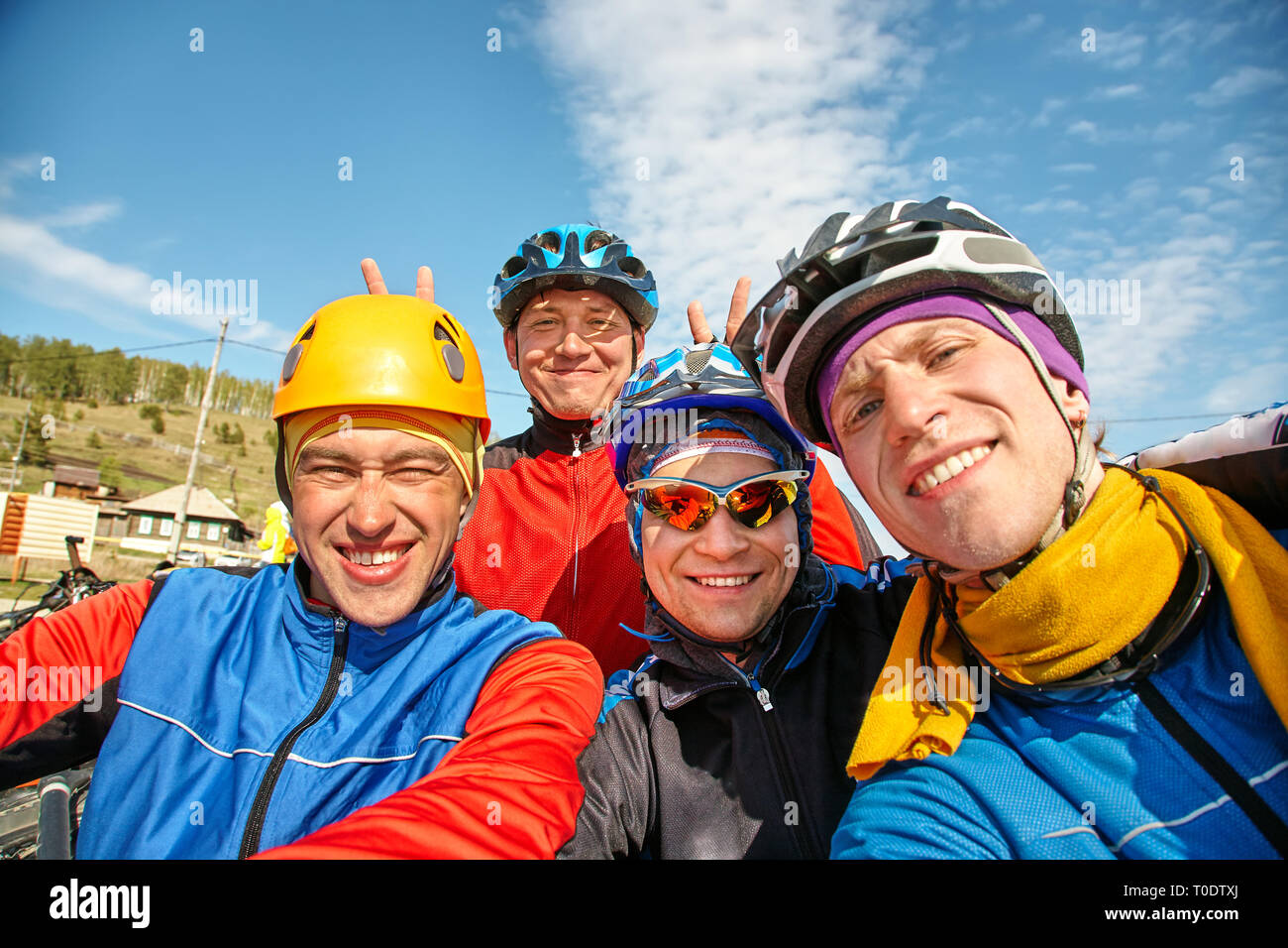 group of cyclists in helmets. team outdoors. mountain bike Stock Photo ...